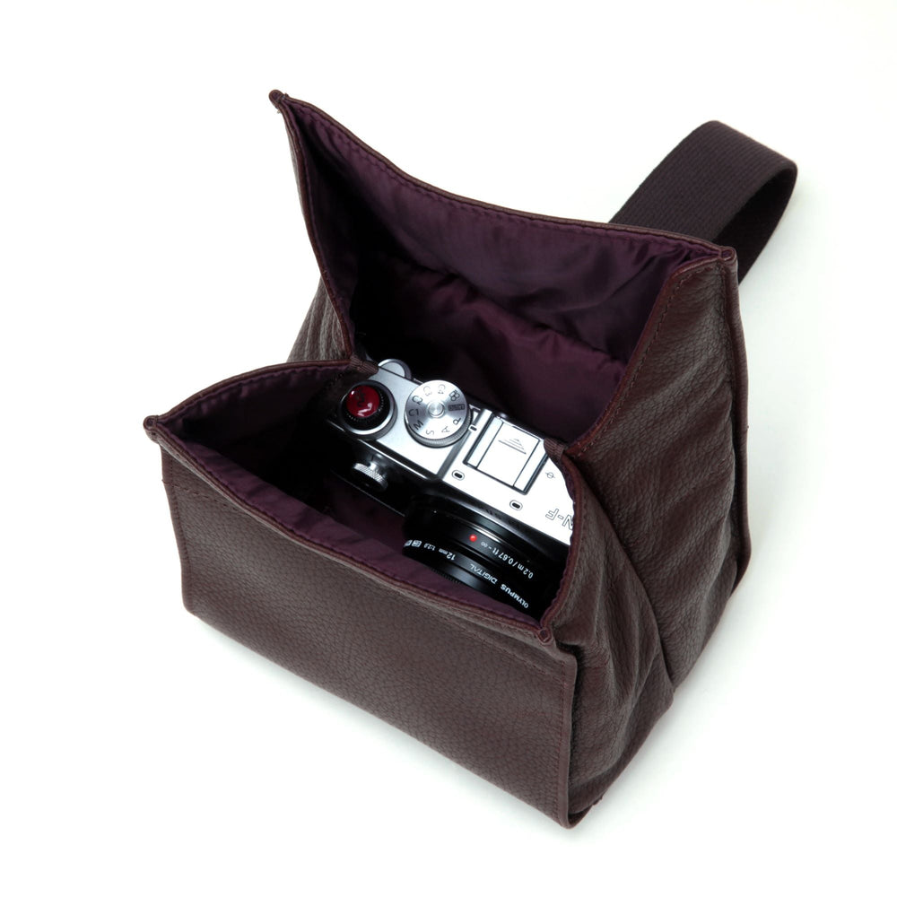 A small leather camera pouch